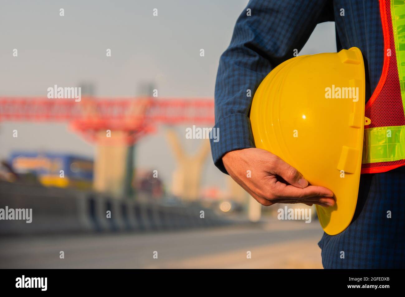 Architect Engineer holding hard hat road construction background Stock ...