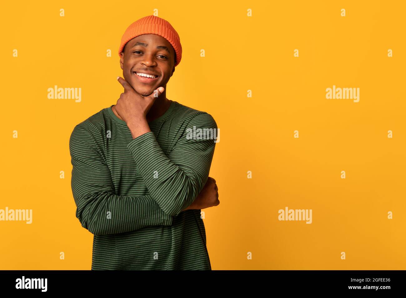 Guy in orange hat hi-res stock photography and images - Alamy