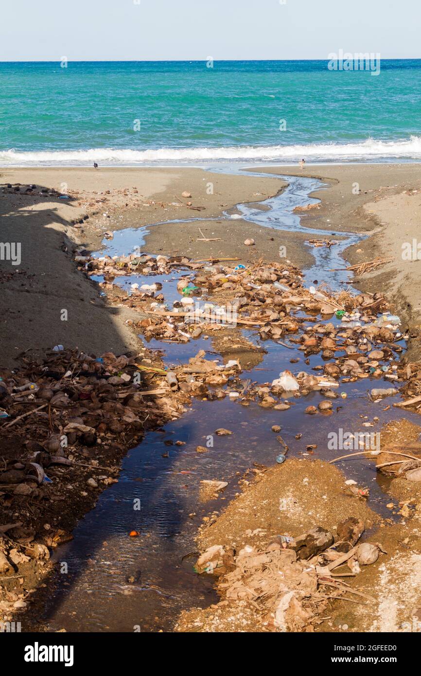 Garbage at the mounth of a small creek in Baracoa, Cuba Stock Photo - Alamy