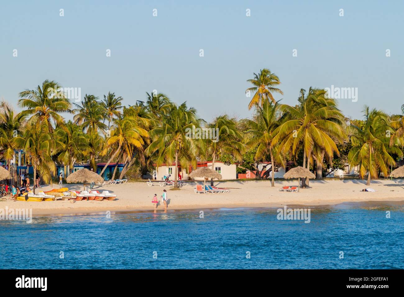 PLAYA GIRON, CUBA - FEB 14, 2016: People on a beach in Playa Giron ...