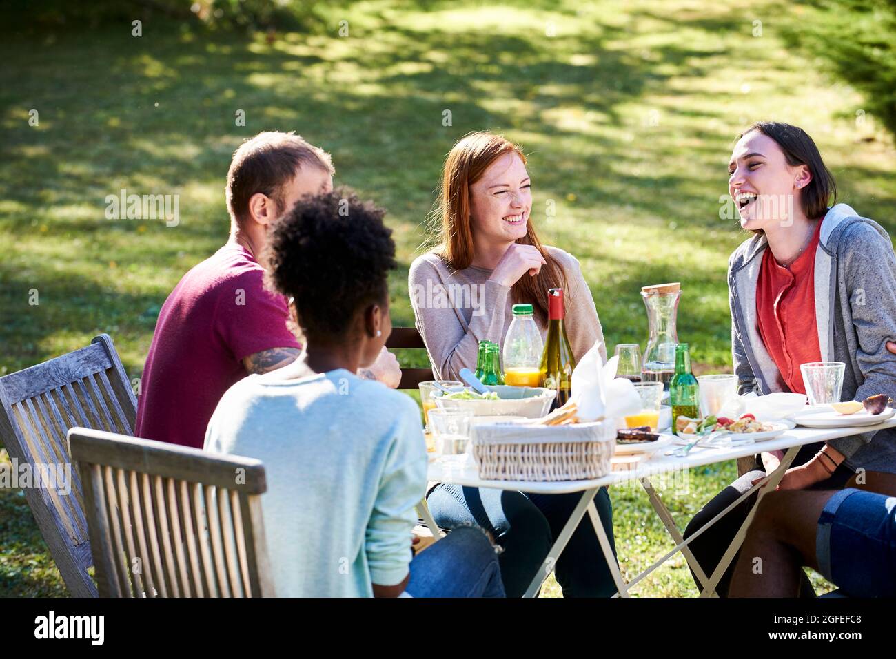 Young woman enjoying refreshments hi-res stock photography and images ...