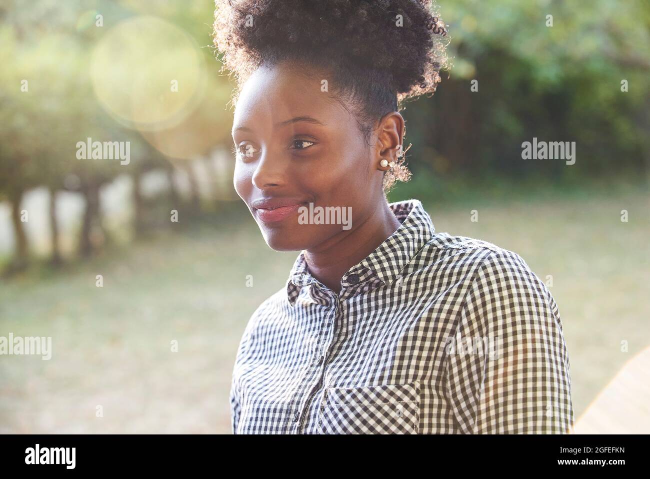 Thoughtful woman in black shirt hi-res stock photography and images - Alamy