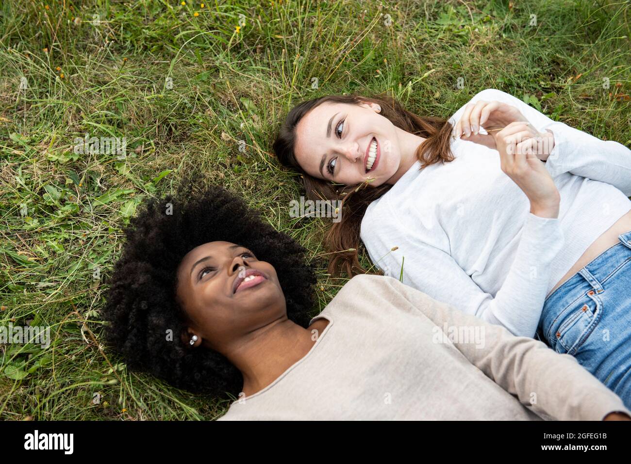 Young adult female dreaming in hi-res stock photography and images - Alamy
