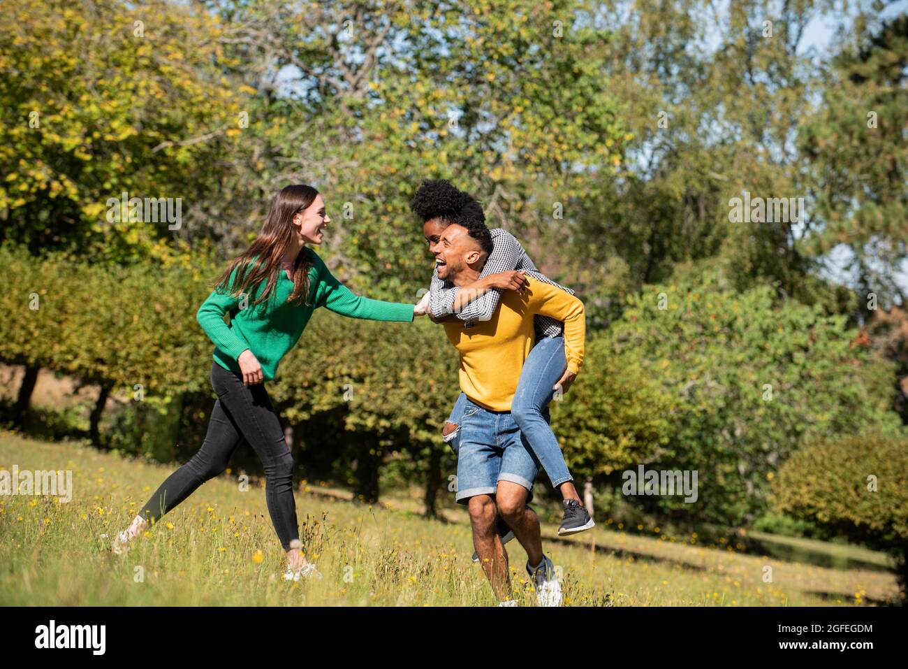Three friends having fun in front hi-res stock photography and images ...