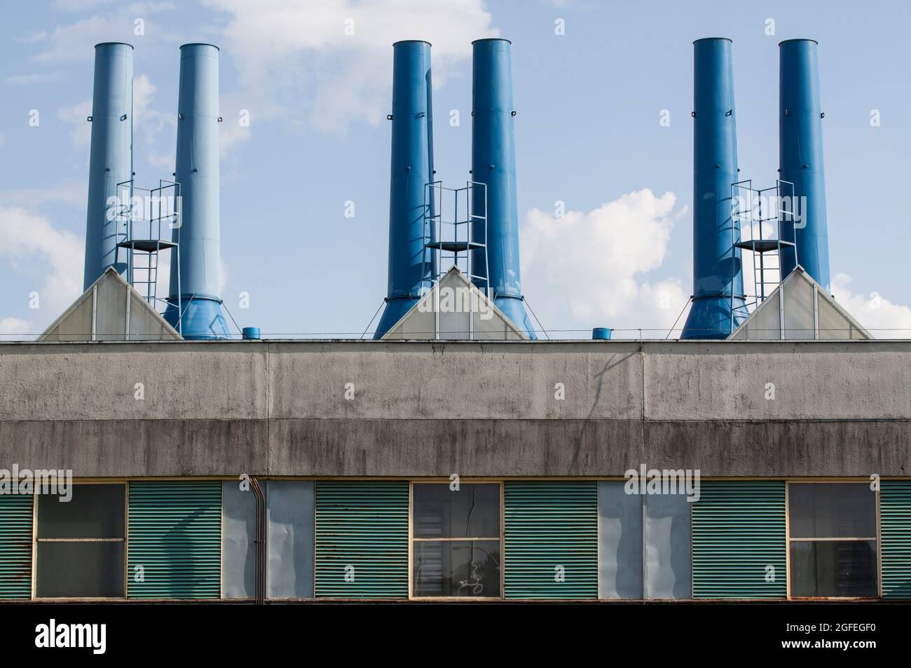Industrial building tall chimney hi-res stock photography and images ...
