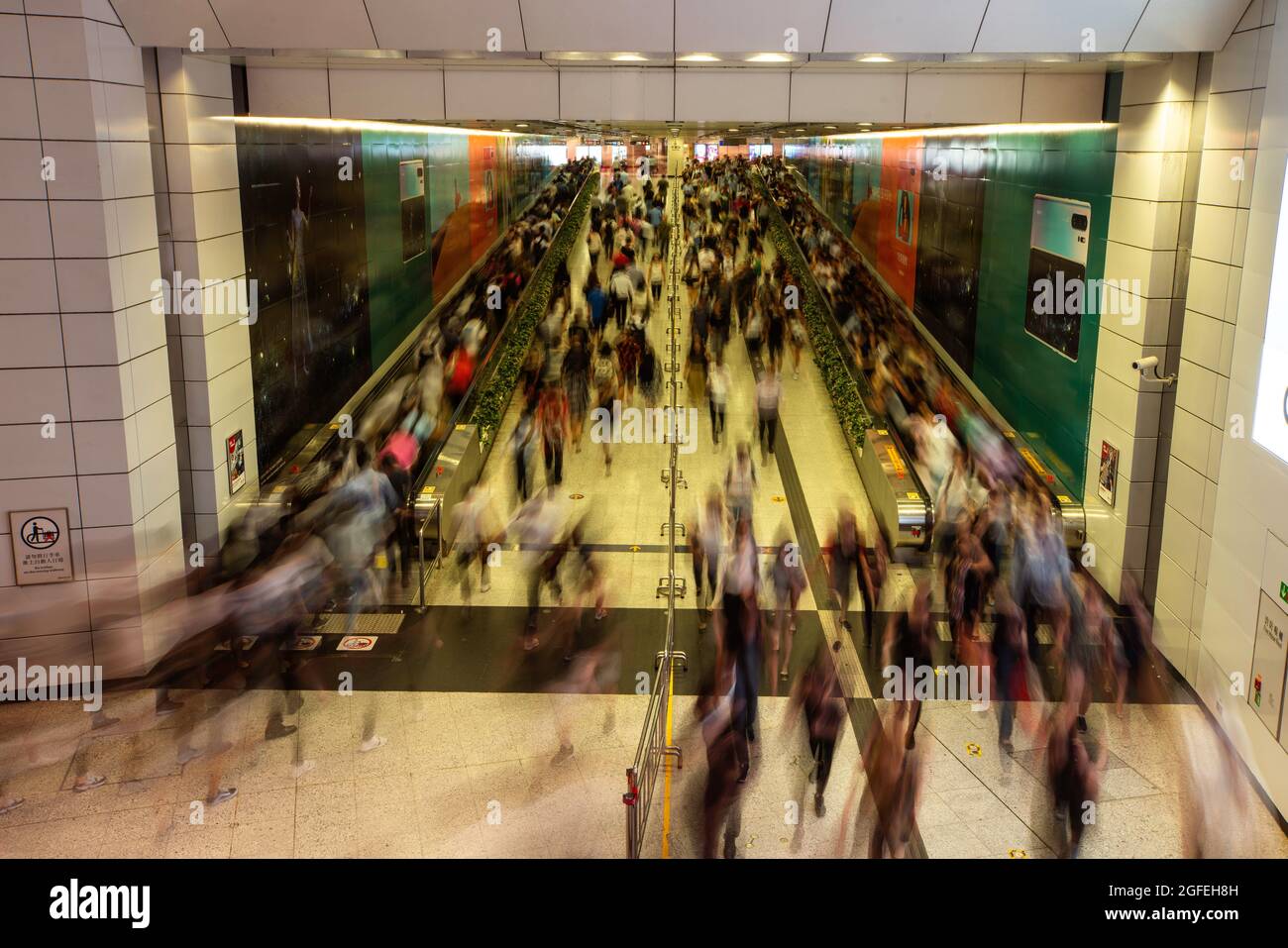 Busy commuters in subway station during rush hour in Hong Kong Stock ...