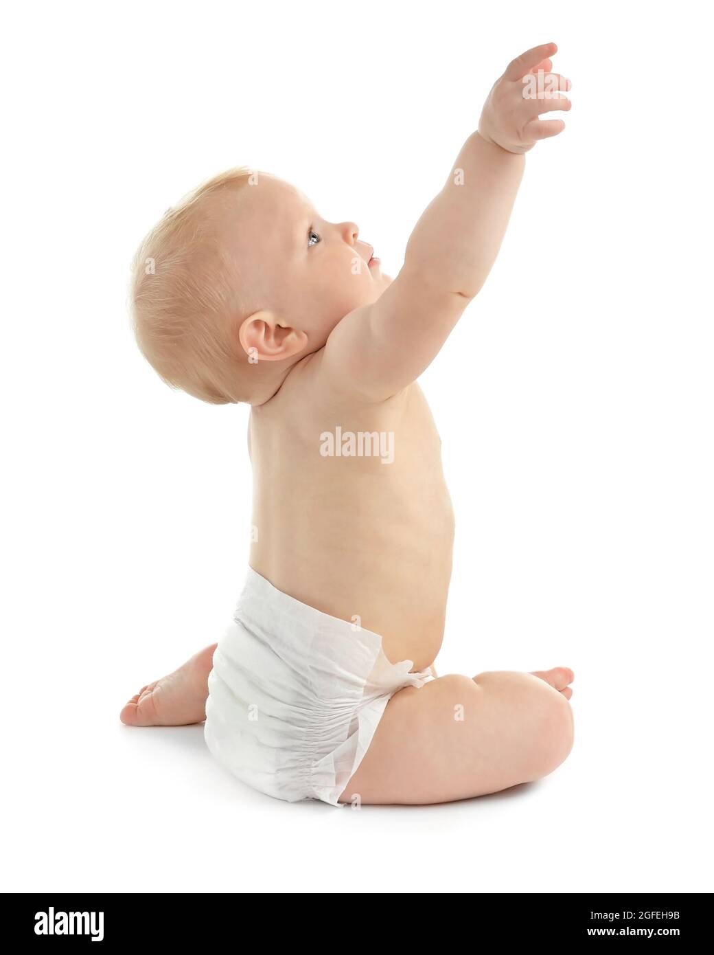 Baby sitting on white background Stock Photo - Alamy