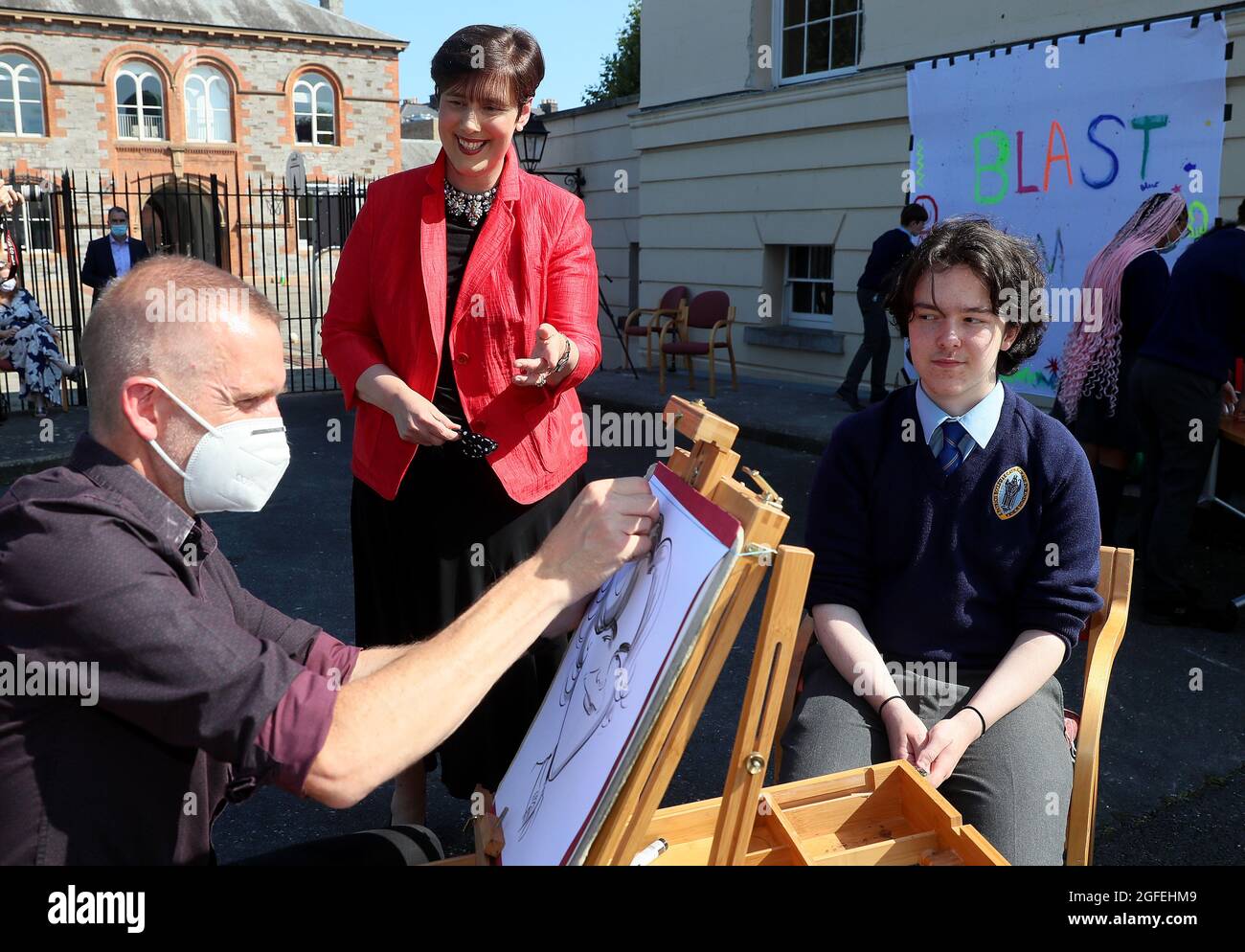 Education Minister Norma Foley (centre) with caricature artist Ken ...