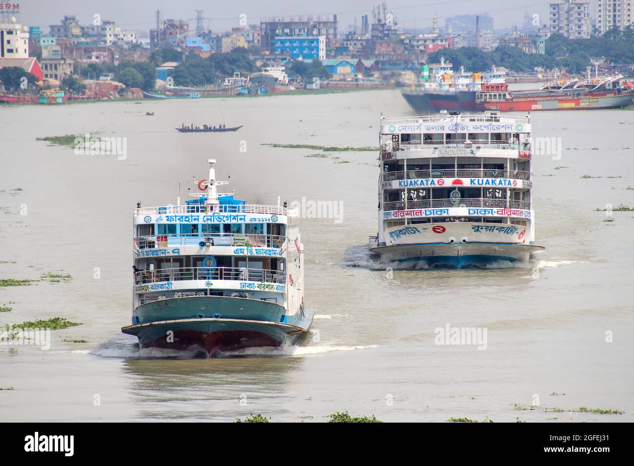 Local Passenger ferry returning to Dhaka river port. Ferry is a very ...