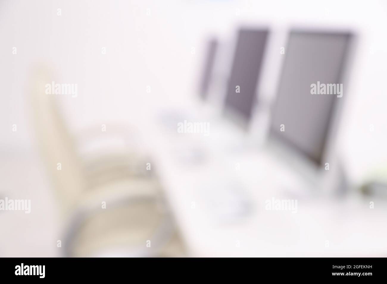 Blurred office background with computers Stock Photo - Alamy
