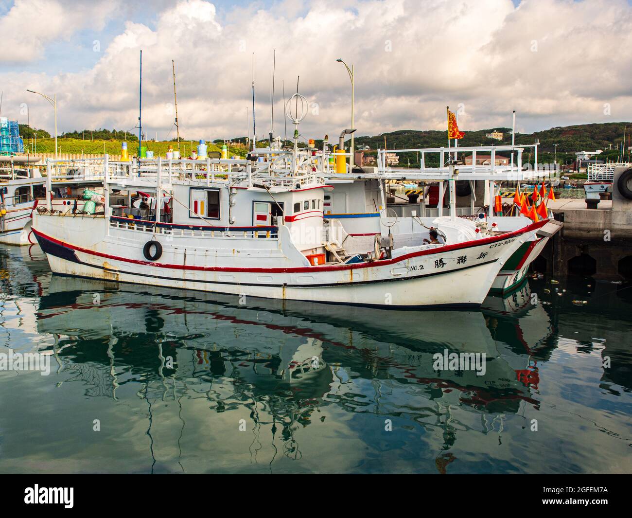 Fuji, Taiwan - October 03, 2016: Fishing boats of different size in ...