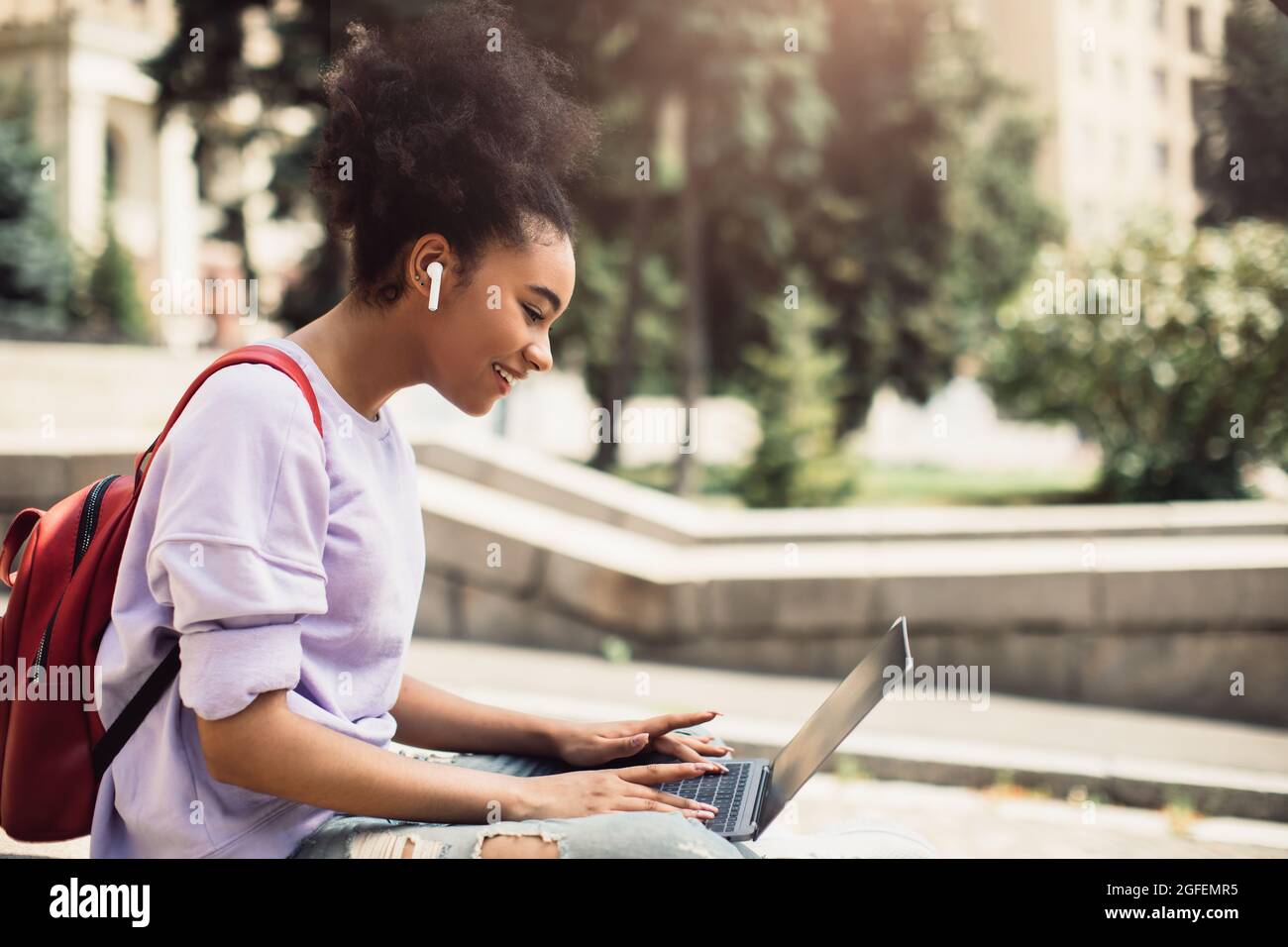 Happy African American Student Girl Browsing Internet On Laptop ...