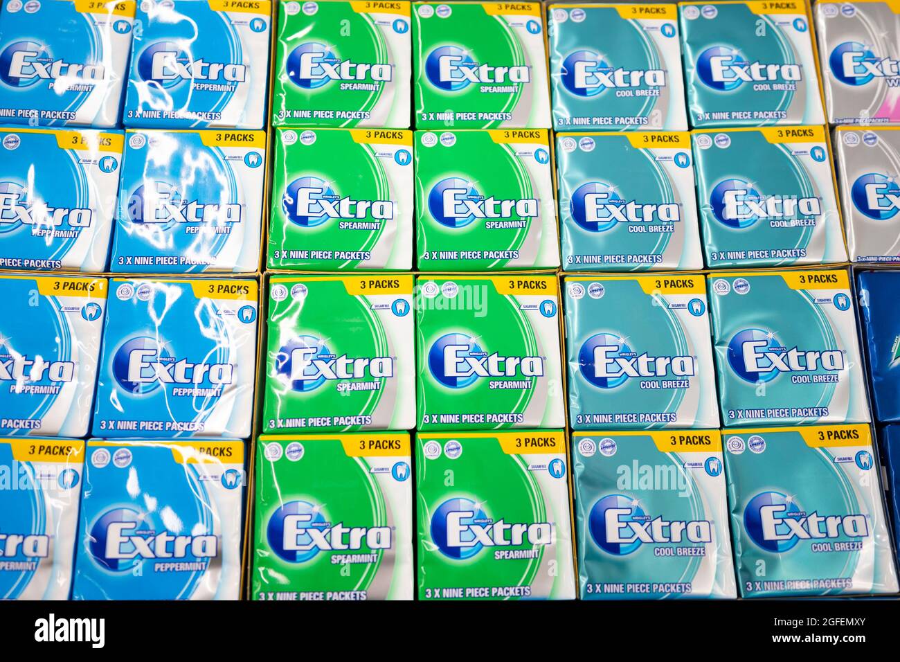 Packets of chewing lined up in a supermarket in the UK Stock Photo - Alamy