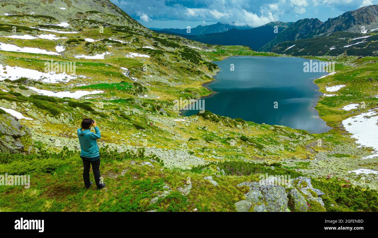 Landscape photography in an mountain range with a female photographer ...