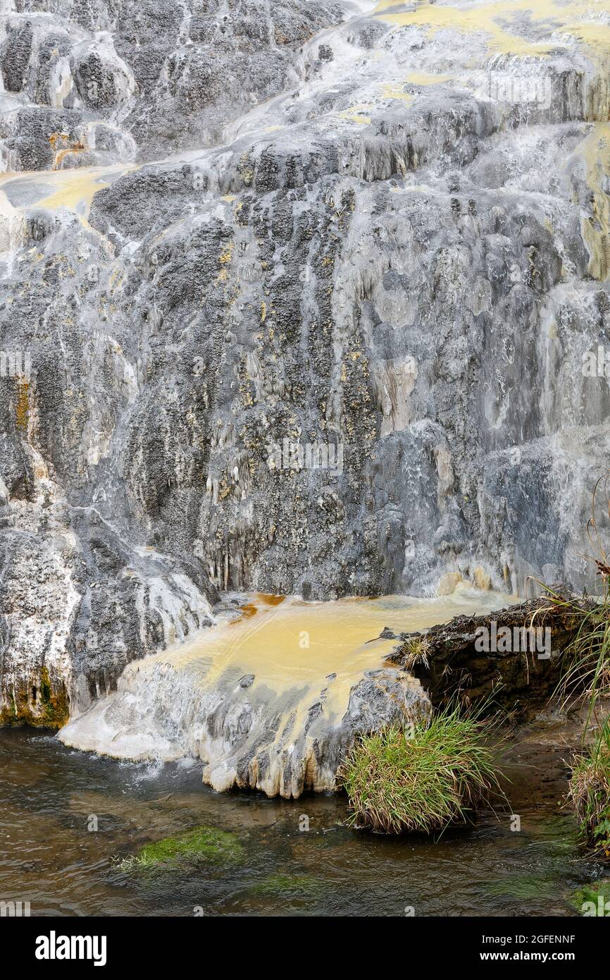 geothermal, hot water cascading over rock, waterfall, steamy, moving ...