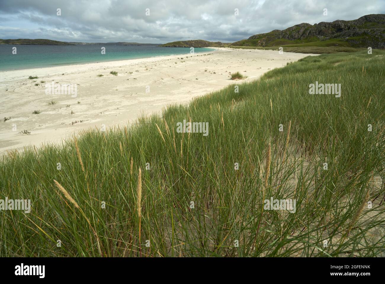 The shell beach at Reef in the Isle of Lewis with the tide line strewn ...