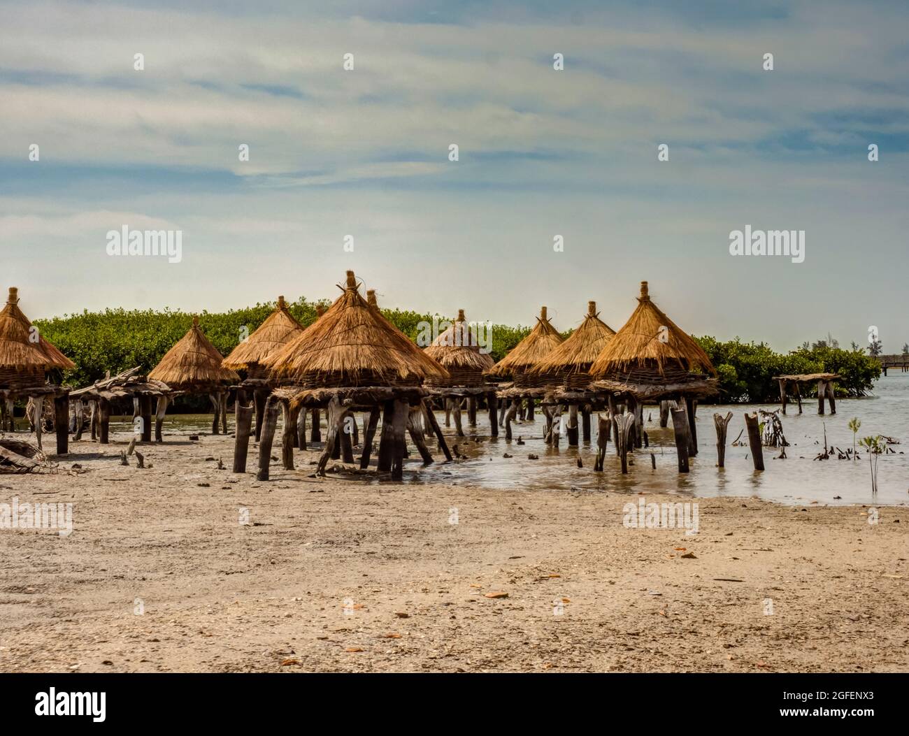 Granaries on a shell island among mangrove trees, Joal-Fadiouth ...