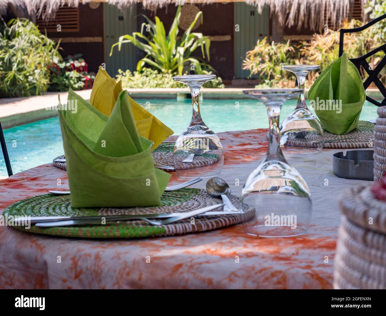 Senegal, Africa - January 2019: A covered table awaits guests next to ...