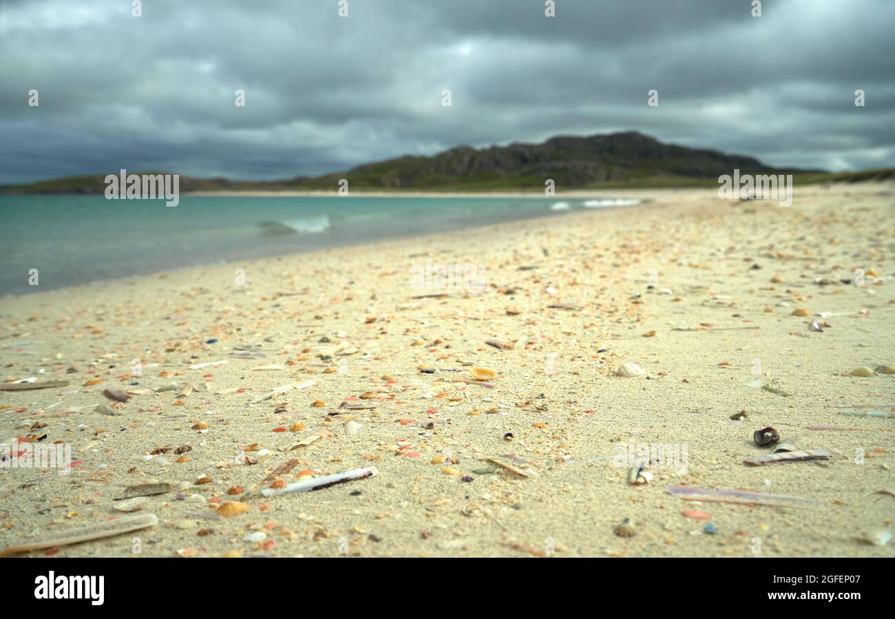The shell beach at Reef in the Isle of Lewis with the tide line strewn ...