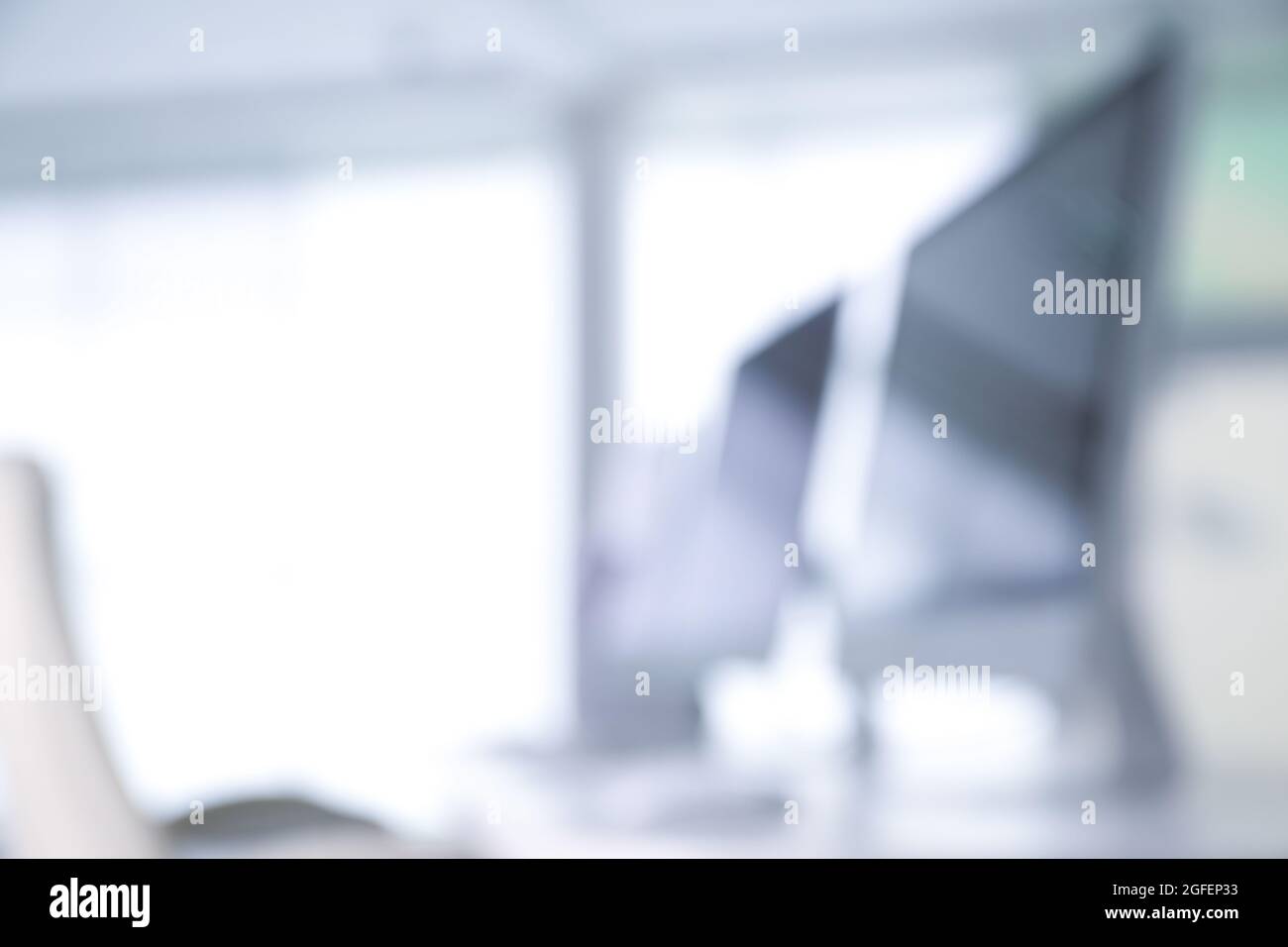 Blurred office background with computers Stock Photo - Alamy