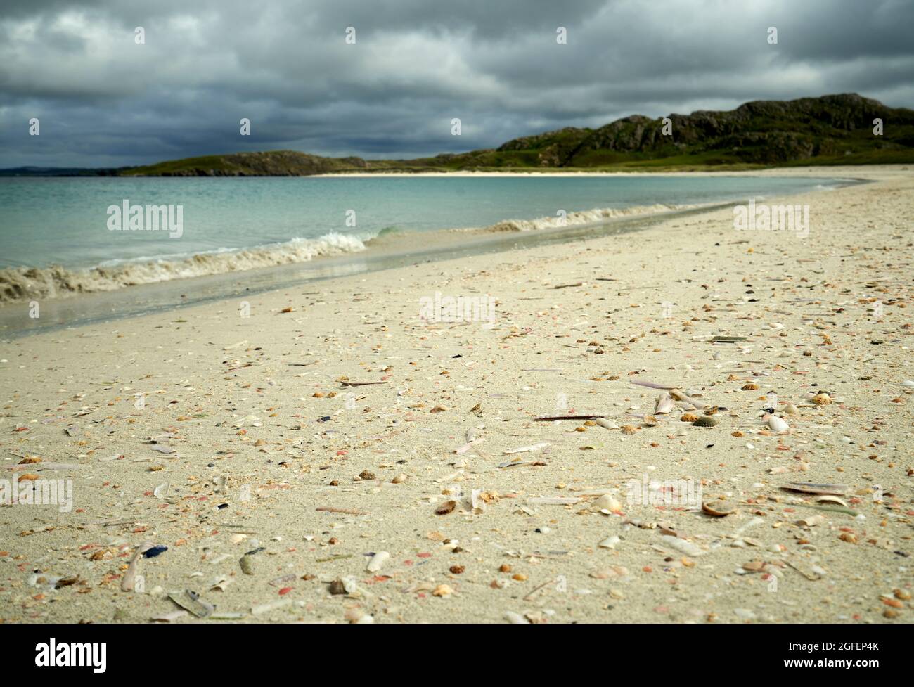 The shell beach at Reef in the Isle of Lewis with the tide line strewn ...