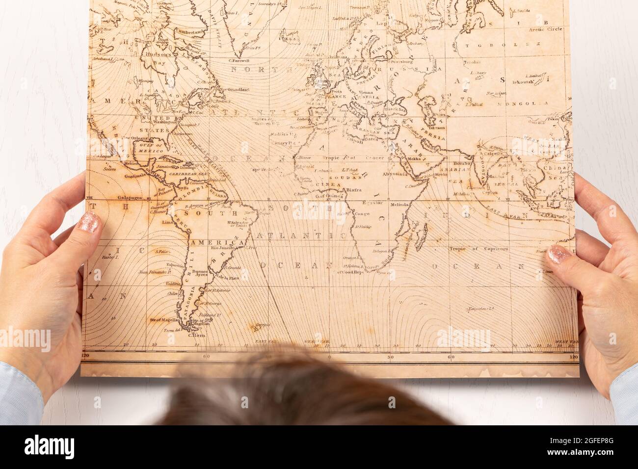 Hold map of the world hi-res stock photography and images - Alamy