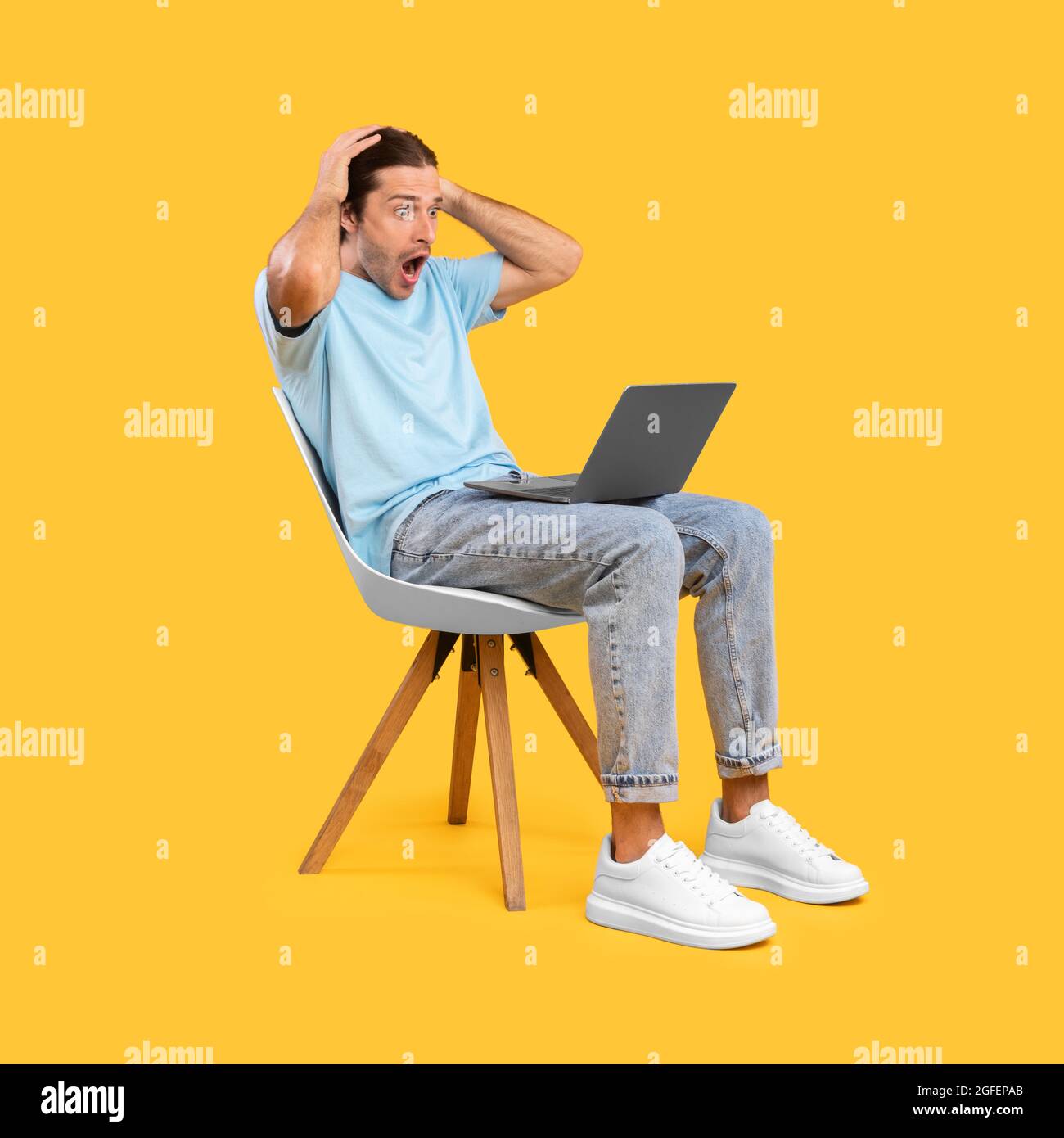 Wow surprised young man using hi-res stock photography and images - Alamy