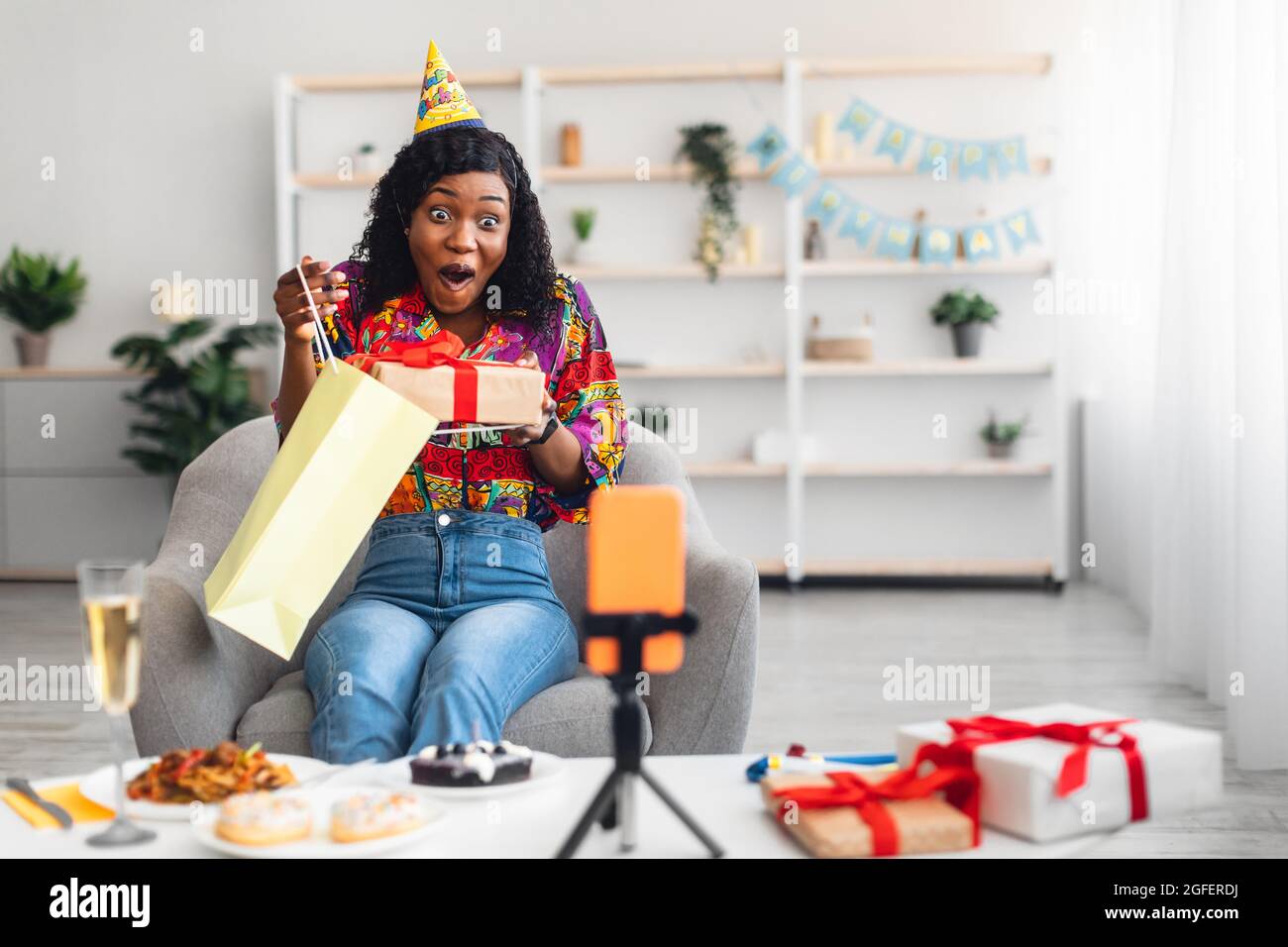 Female Having Video Call Via Smartphone Receiving Birthday Gifts Indoor ...