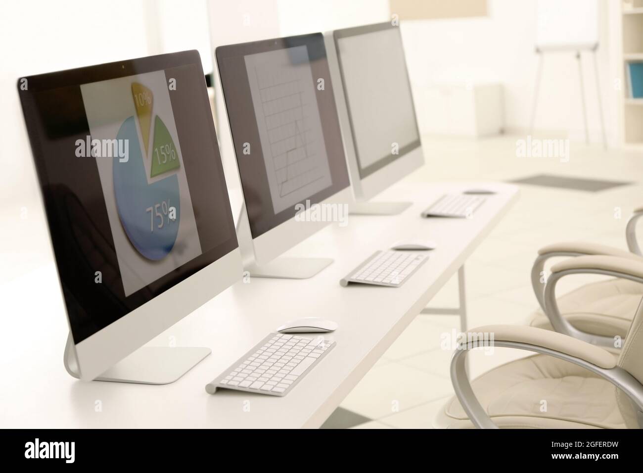 Modern computers in the office Stock Photo - Alamy