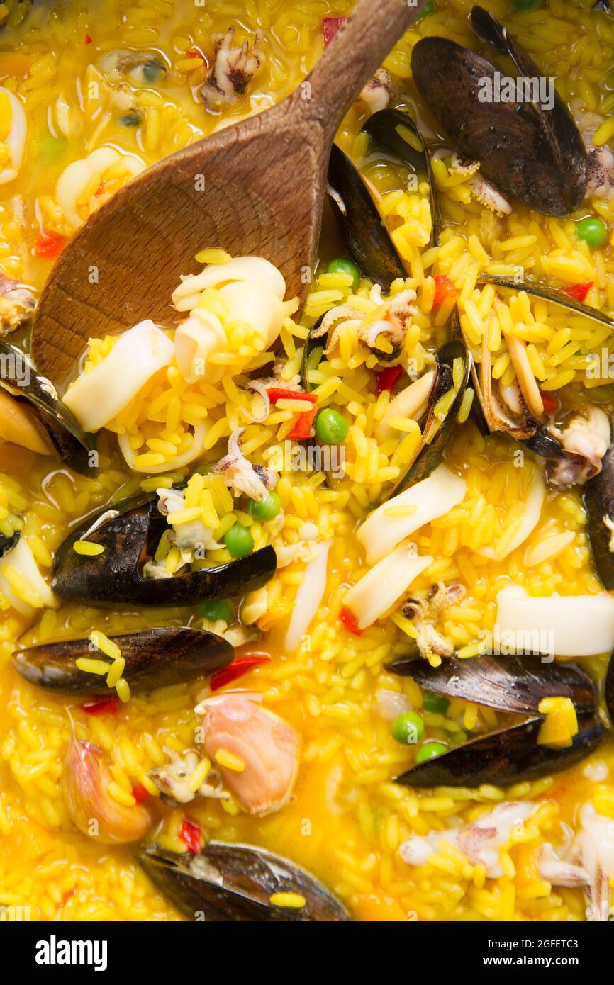 Presentation of a dish of Spain, paella being cooked Stock Photo - Alamy