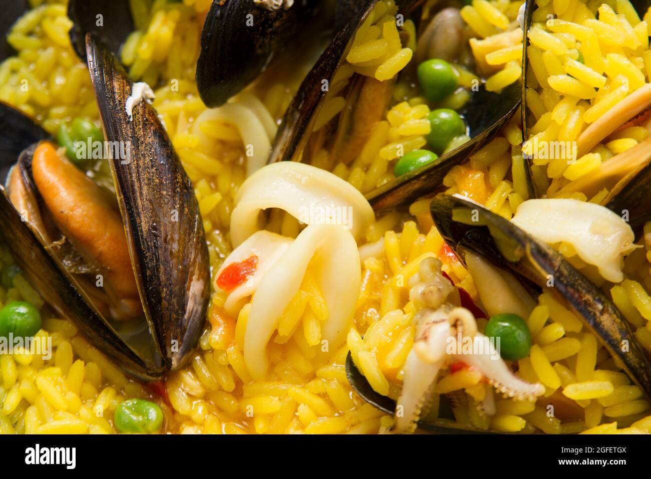 Presentation of a dish of Spain, paella being cooked Stock Photo - Alamy