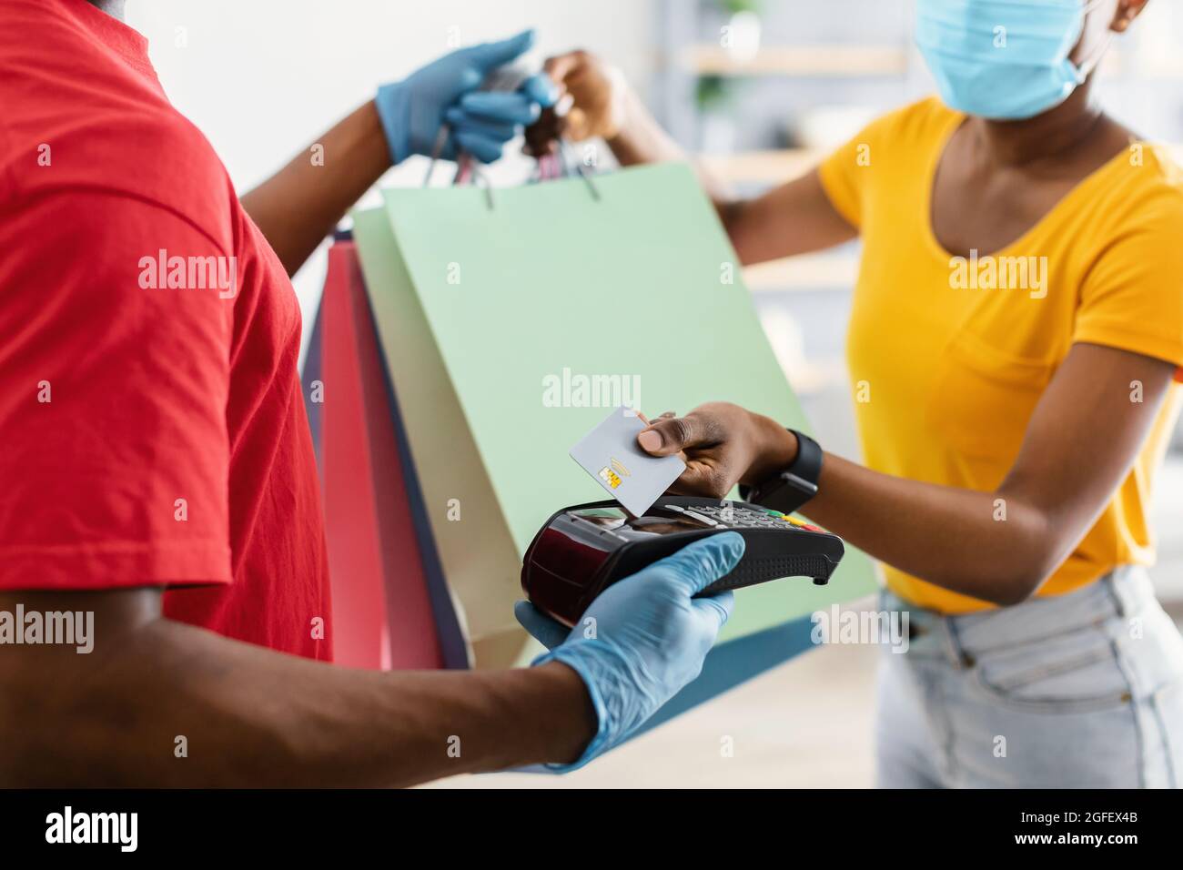 African Woman Paying Courier For Delivery Service At Home, Cropped ...