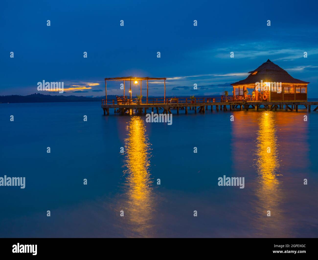 Ora Beach, Indonesia - February 14, 2018: Houses on the water in Ora ...