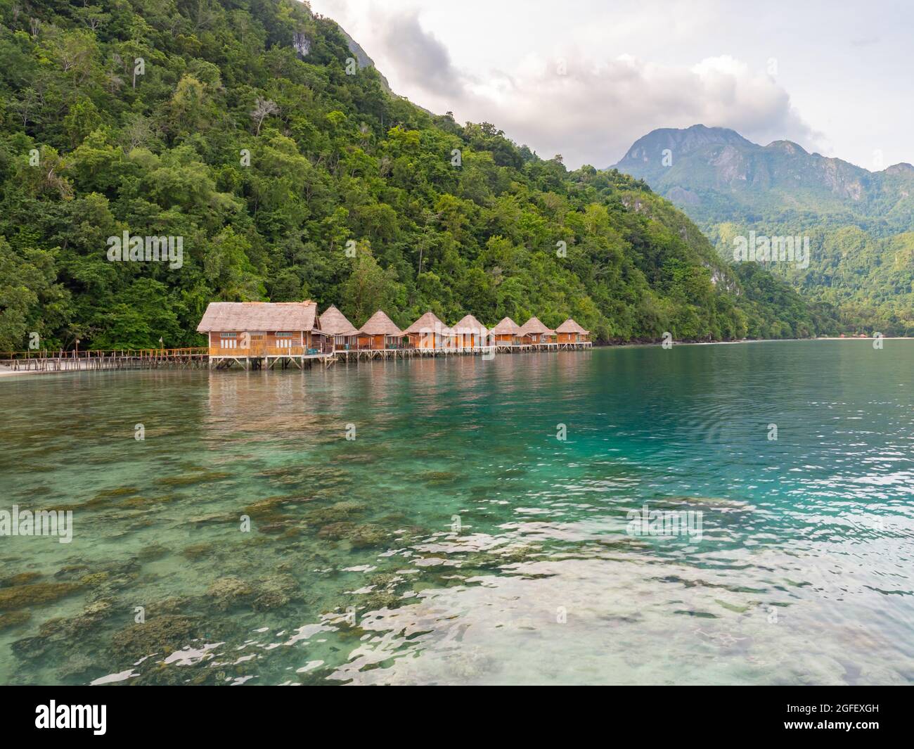 Ora Beach, Indonesia - February 14, 2018: Houses on the water in Ora ...