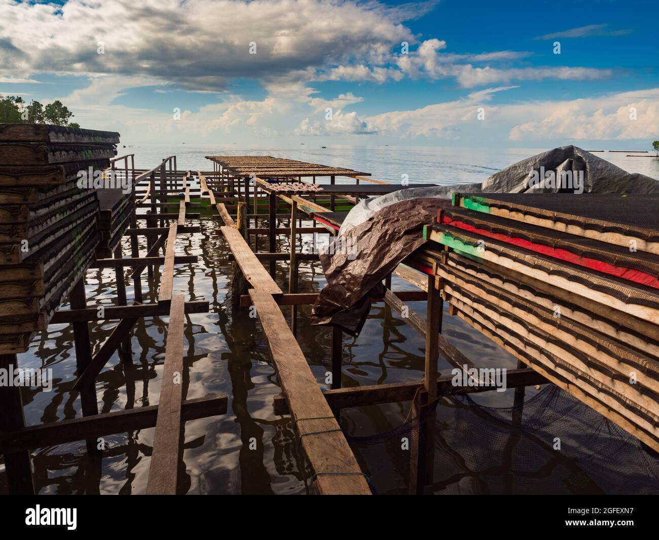 Special structures and nets prepared for drying fish in Kaimana in the ...