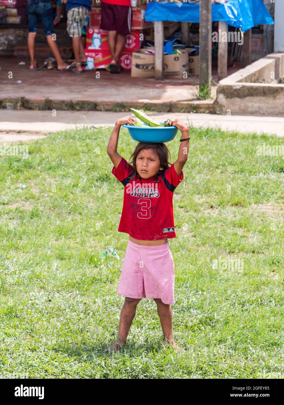 Small village by Amazon River, Peru - Dec, 2018: Child labor. Small ...
