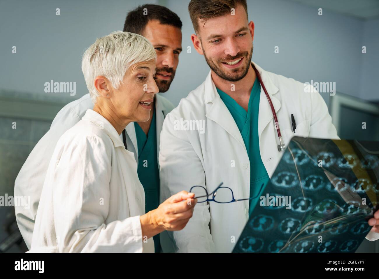 Group of doctors checking x-rays in a hospital Stock Photo - Alamy
