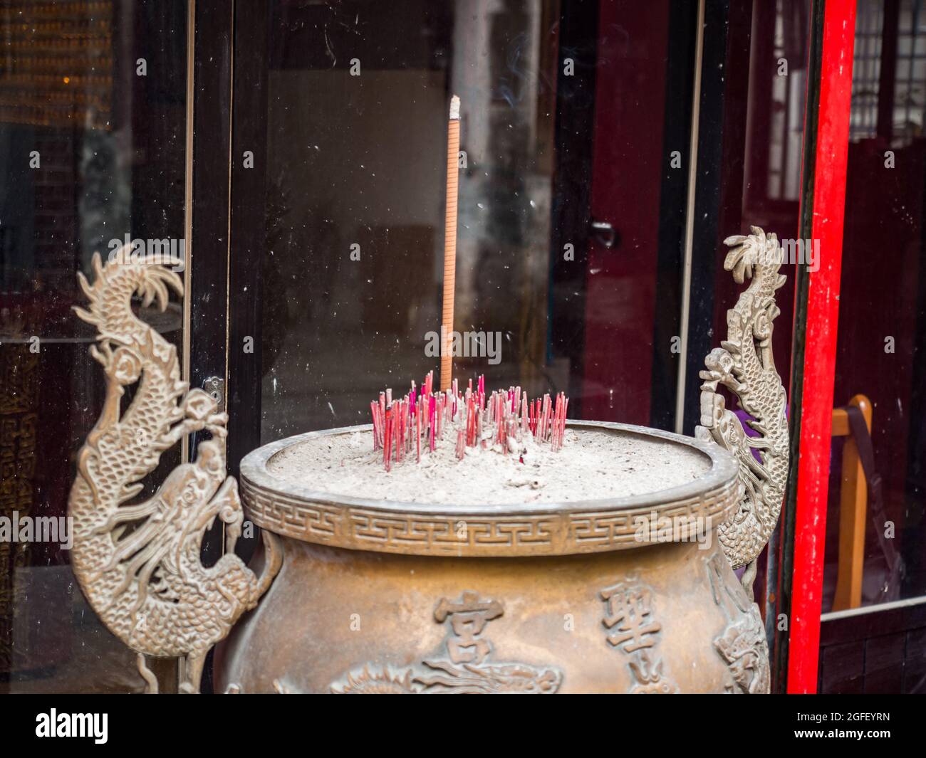 Taipei, Taiwan - October, 2016: A lot of incense sticks in the golden ...