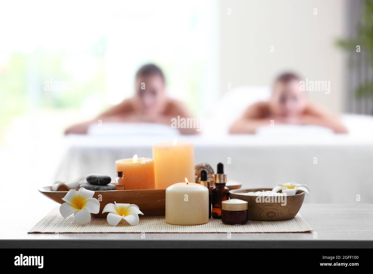 Spa composition and girls on blurred background Stock Photo - Alamy