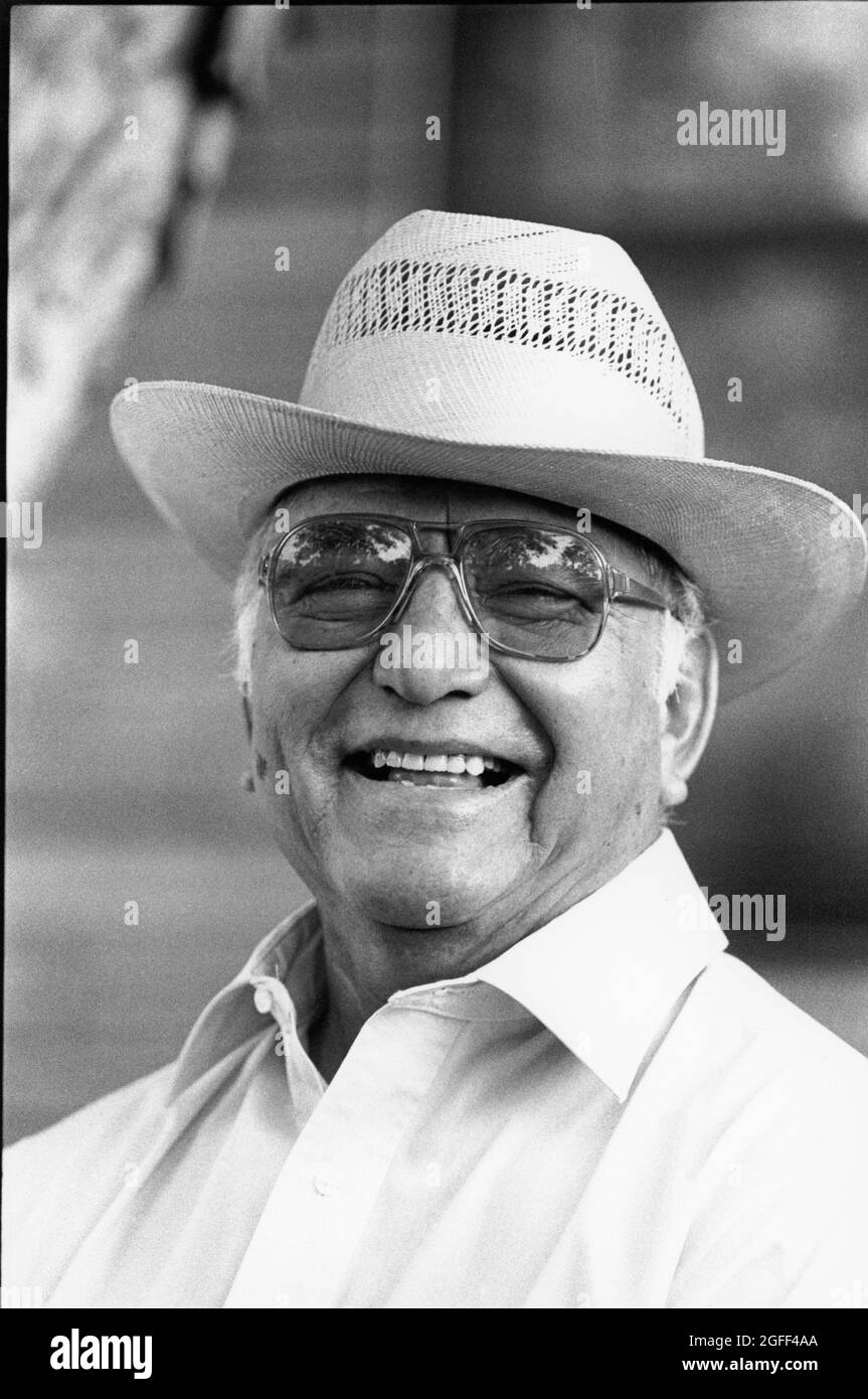 San Antonio Texas USA, circa 1994:Smiling Hispanic man wearing hat to ...