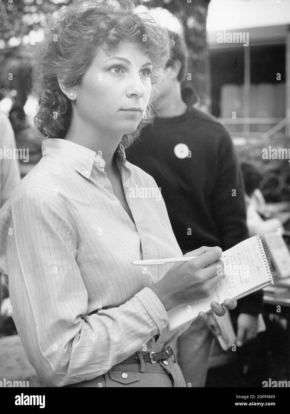 Austin Texas USA, circa 1984: Female student taking notes in her ...