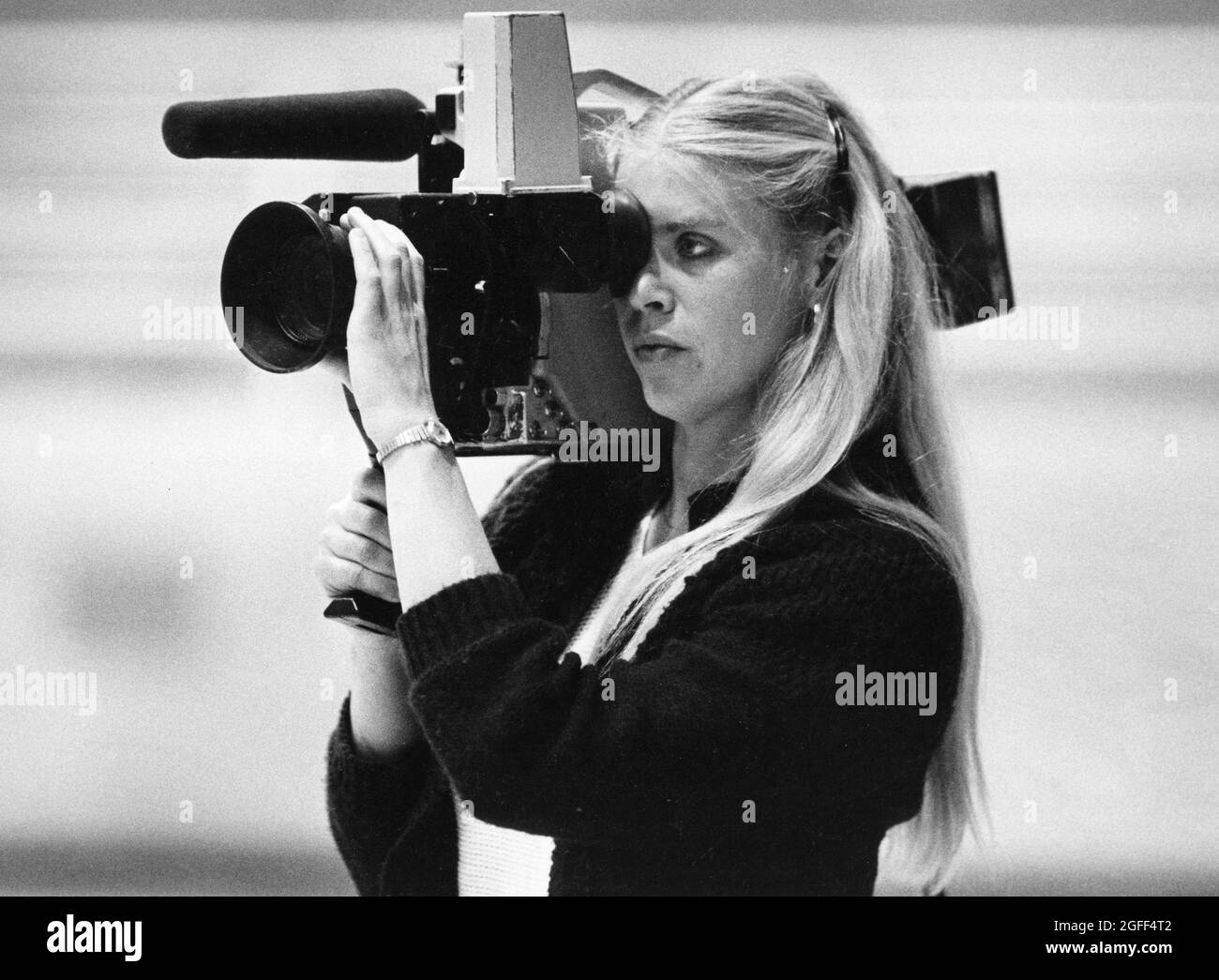 Austin Texas USA, circa 1991: Female television camera operator records ...