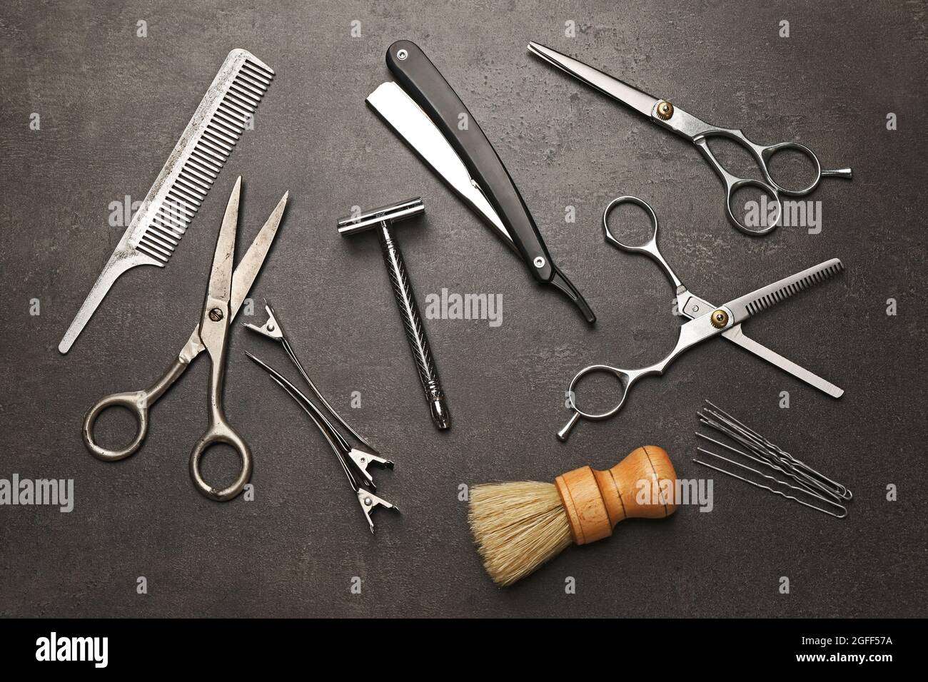 Vintage tools of barber shop on grey background Stock Photo - Alamy