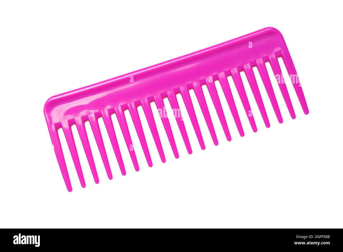 Pink plastic comb isolated on white Stock Photo - Alamy