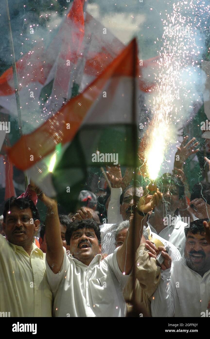 Congress workers carrying party flags and portraits of Party President ...