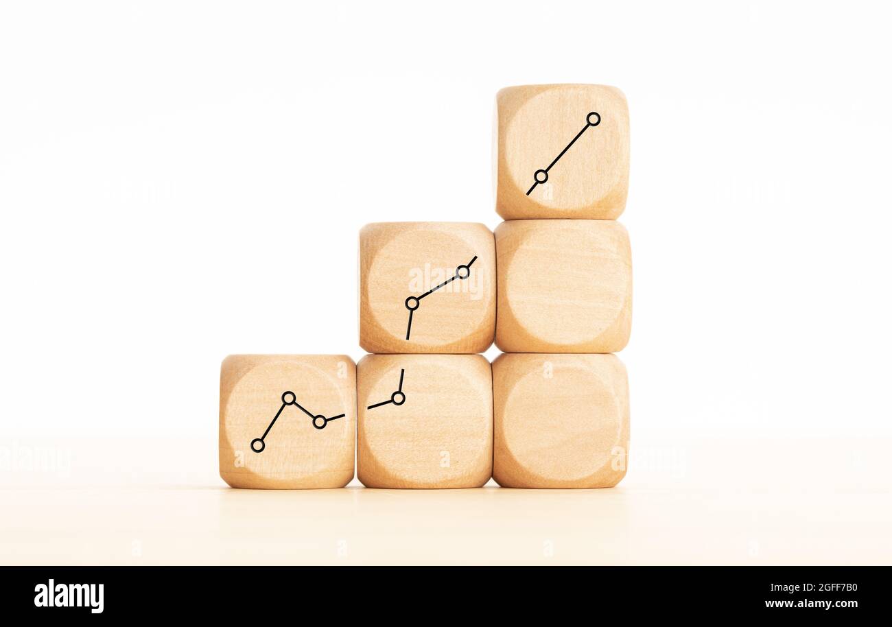 Growth chart drawing on wooden block shape. Copy space. White ...
