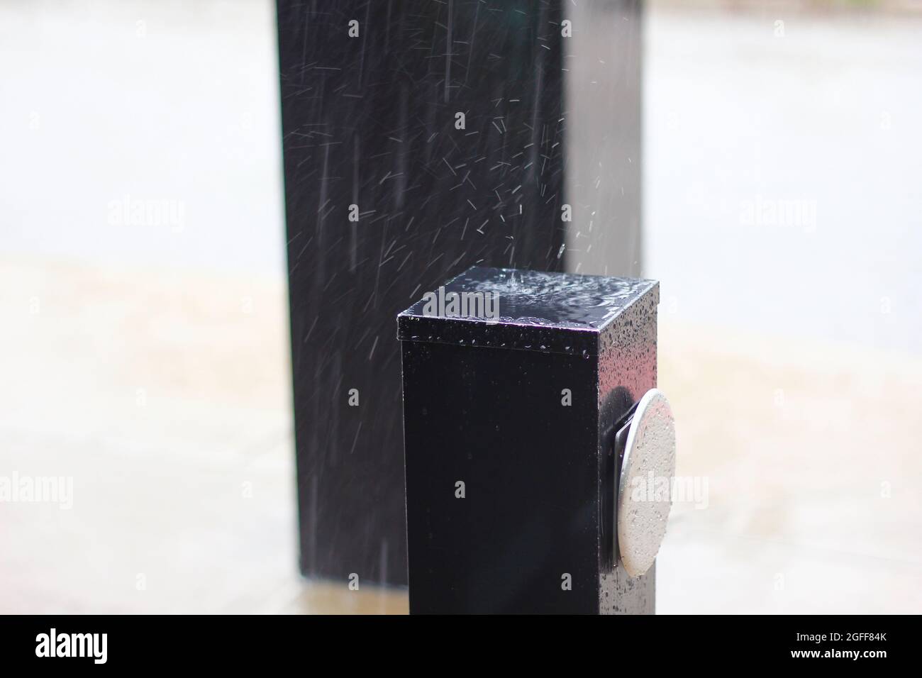 Square Columns with Rain Falling on them Stock Photo - Alamy
