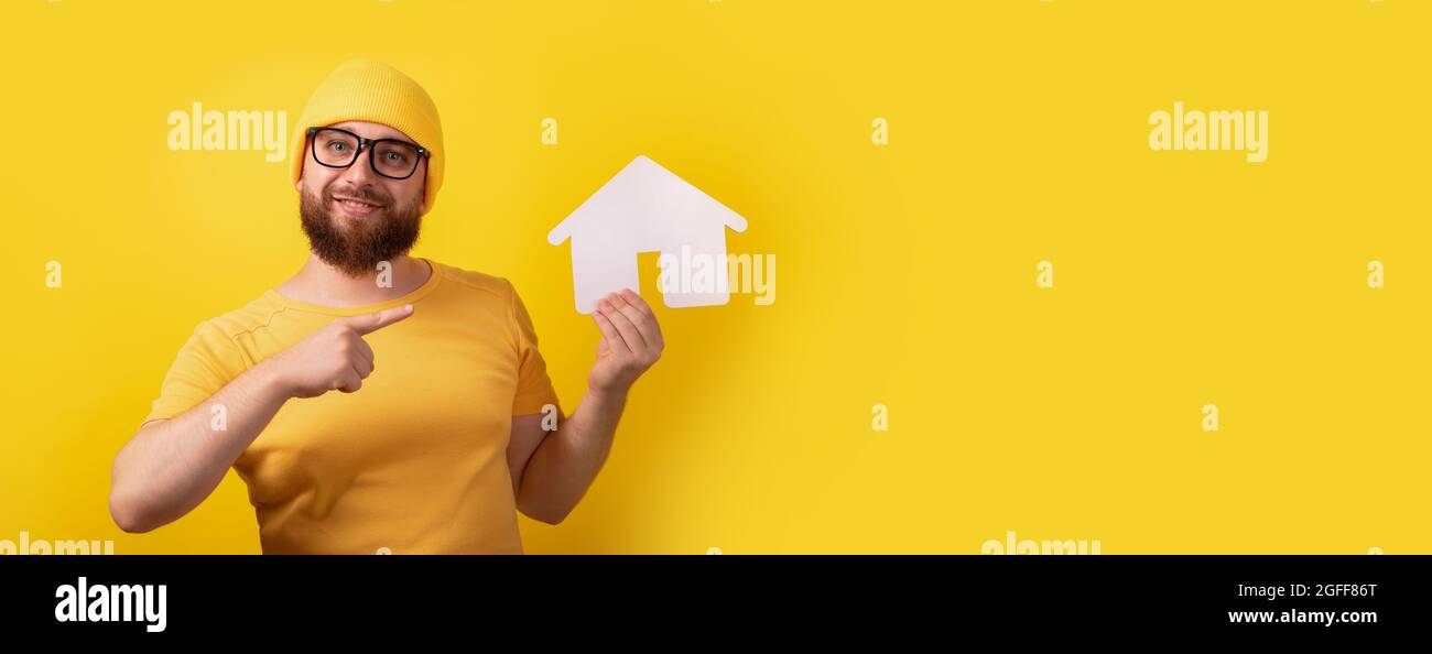 Hand businessman pointing house hi-res stock photography and images - Alamy