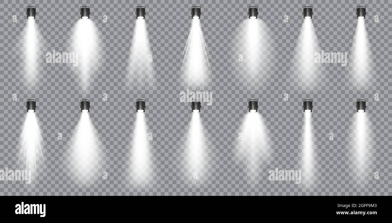Illuminated studio spotlights collection. Bright light beam ...