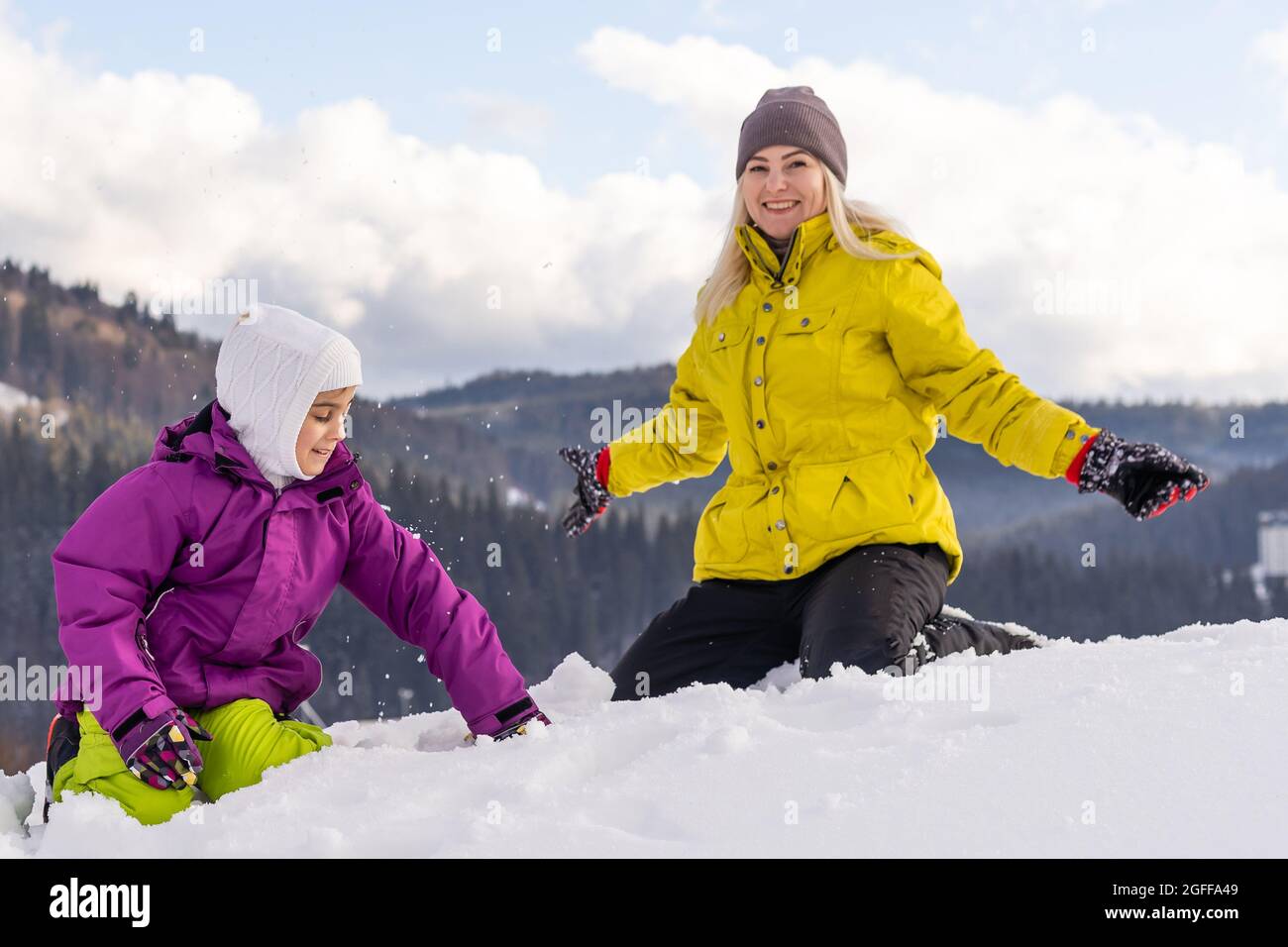 Winter,ski, snow and sun - family enjoying winter vacation Stock Photo ...